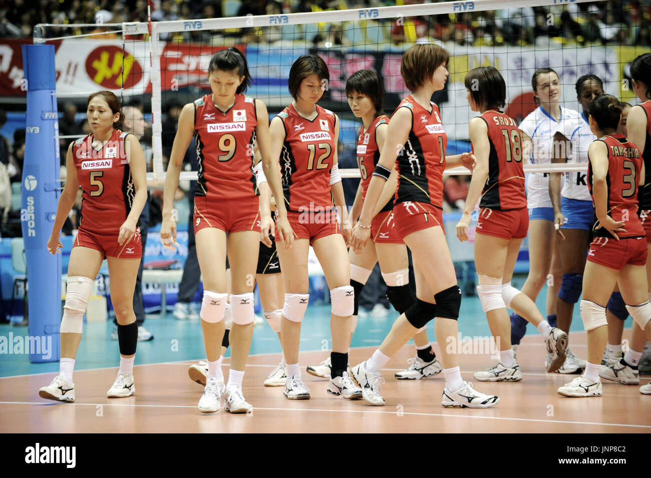 OSAKA, Japan - Japanese volleyball players look downcast after ...