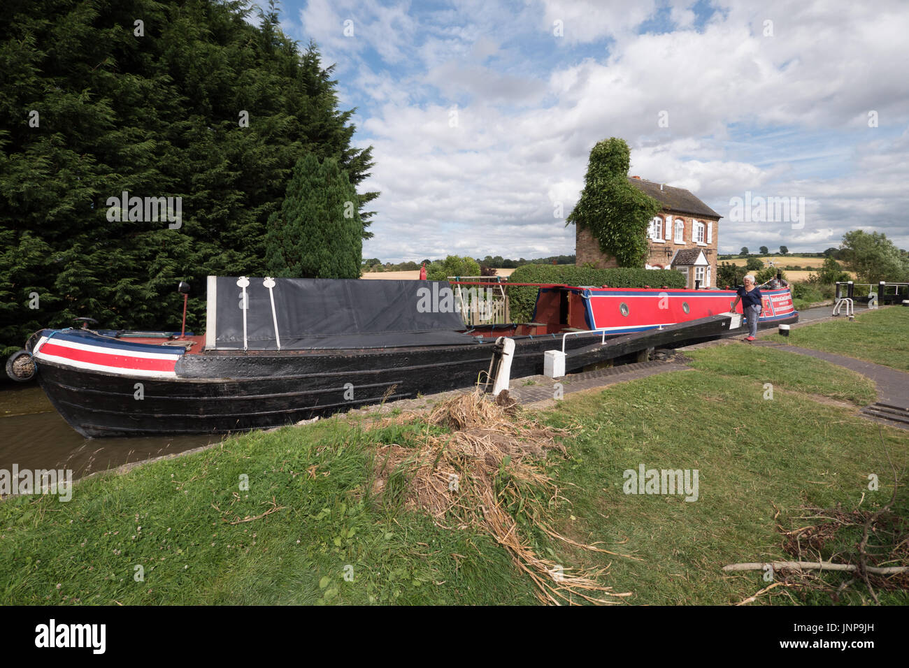 A historic working narrowboat at Somerton Deep Lock on the Oxford Canal ...