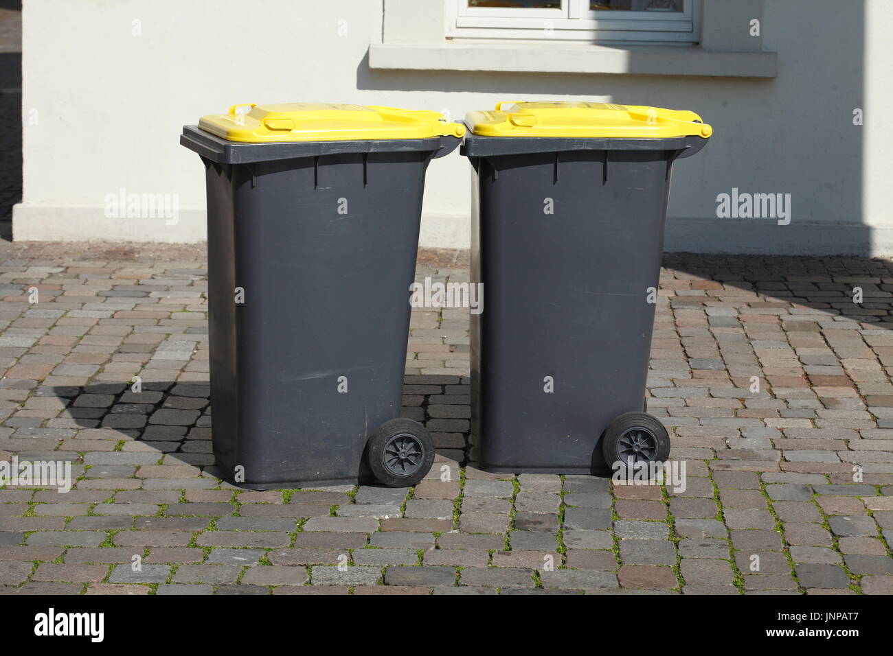 Yellow Recycling Bins for plastic Waste Stock Photo - Alamy