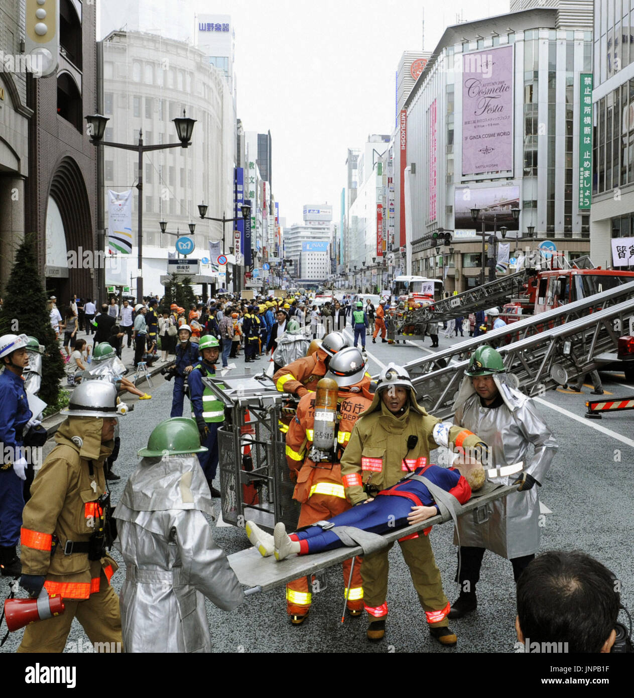 TOKYO, Japan - A disaster prevention drill is conducted in Tokyo's ...
