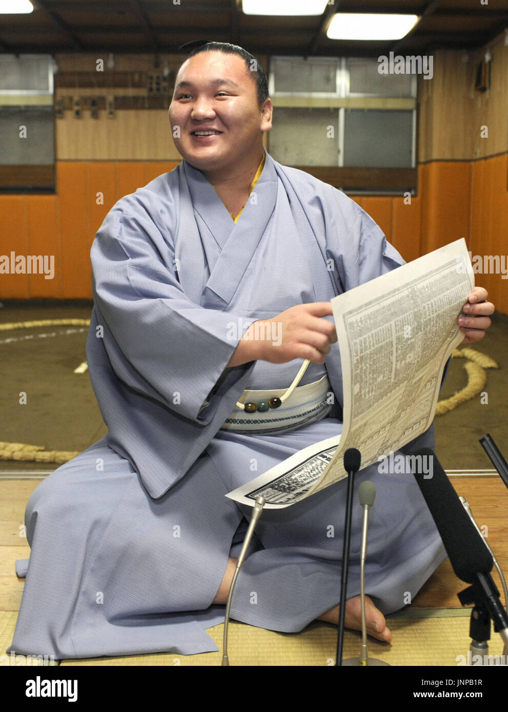 TOKYO, Japan - Mongolian yokozuna (grand champion) Hakuho poses with a ...