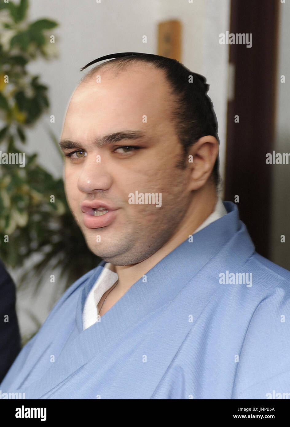 TOKYO, Japan - Russian sumo wrestler Roho speaks to reporters in front ...
