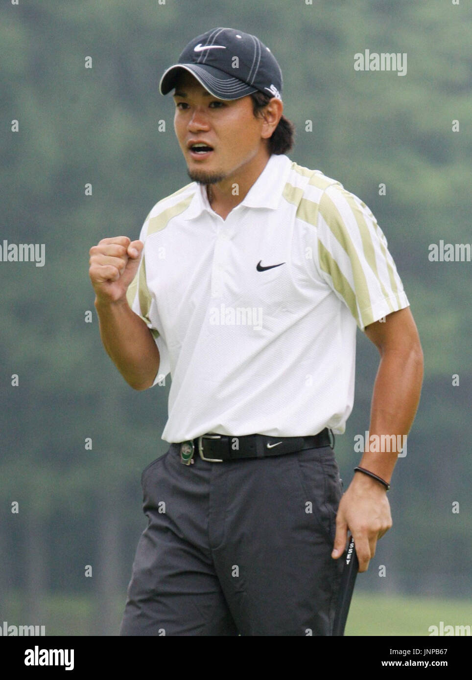 FUJIKAWAGUCHIKO, Japan - Toyokazu Fujishima reacts after winning the ...