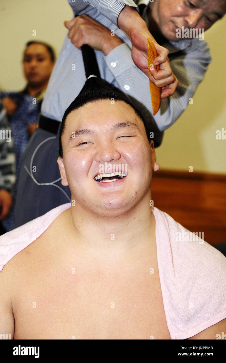 TOKYO, Japan - Mongolian yokozuna (grand champion) Hakuho smiles after ...