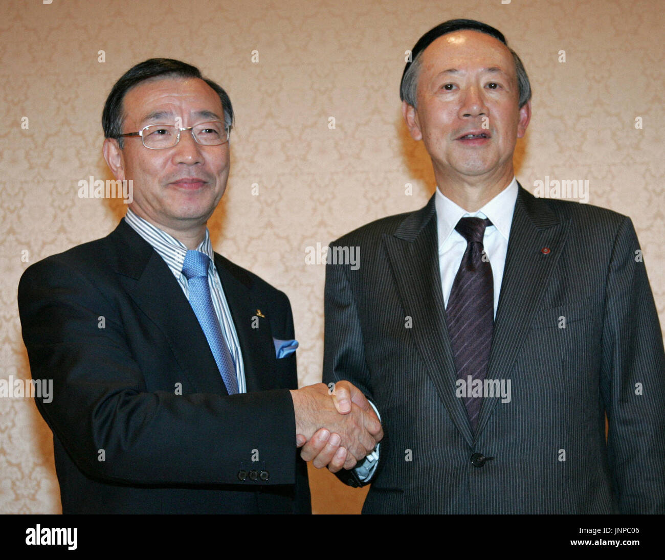 TOKYO, Japan - H2O Retailing Corp. Chairman Shunichi Sugioka (L) and ...