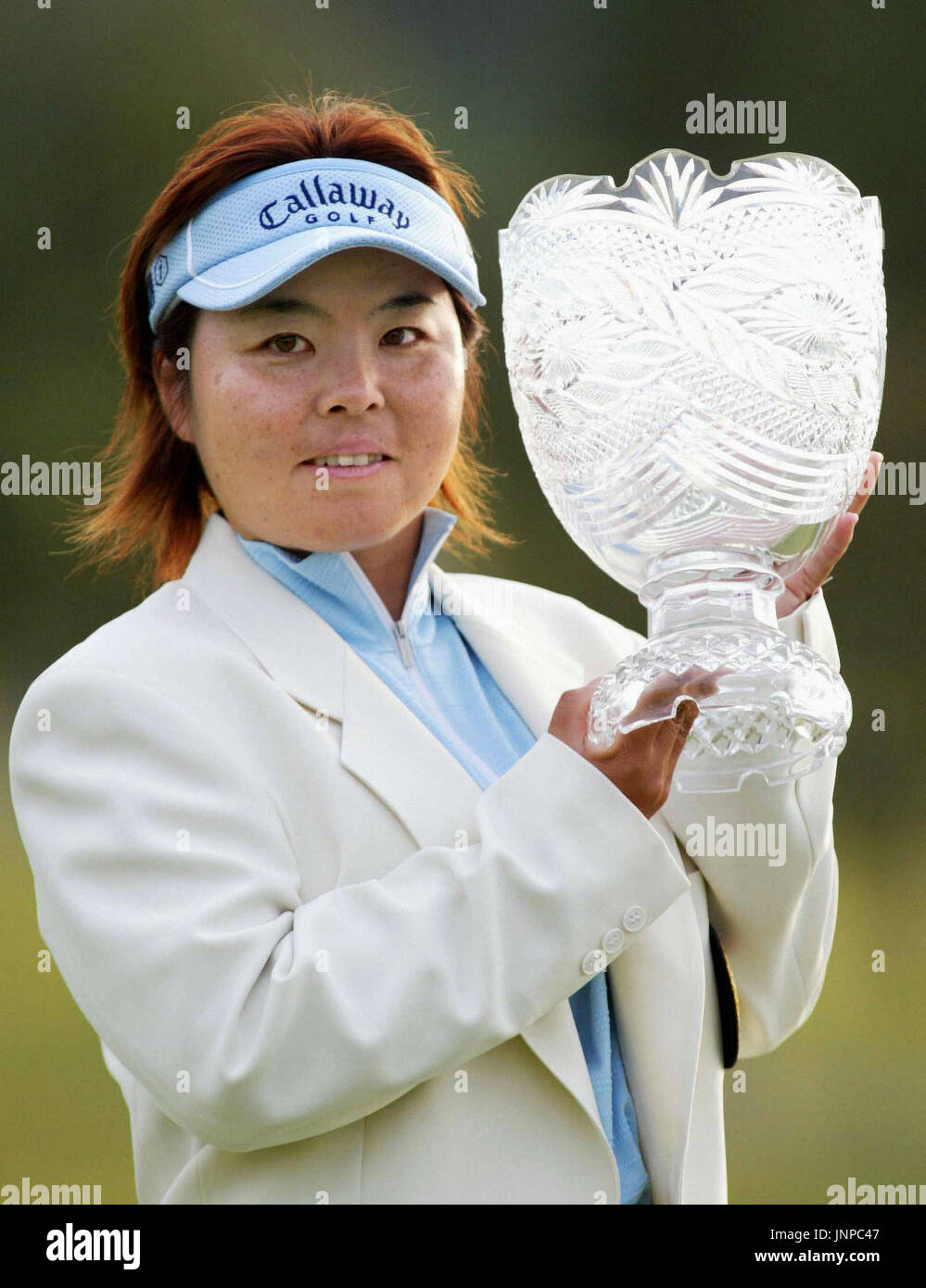 CHIBA, Japan - Yuri Fudo poses with the trophy after winning the ...