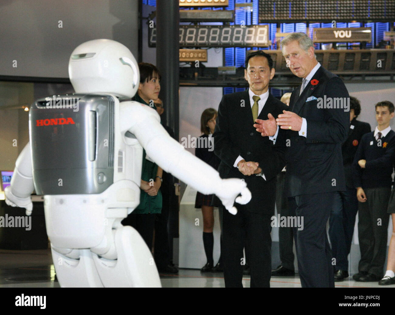 TOKYO, Japan - Britain's Prince Charles (R) is briefed by Mamoru Mohri ...