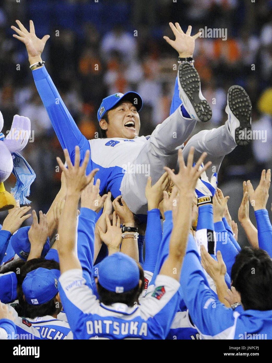 TOKYO, Japan - Seibu Lions manager Hisanobu Watanabe is tossed into the ...