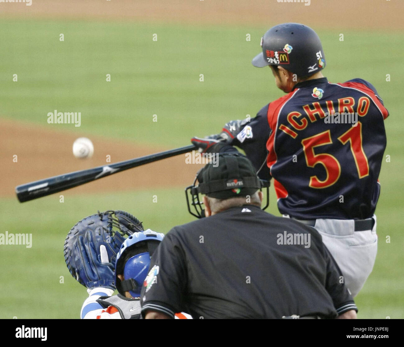 LOS ANGELES, United States - Japan leadoff batter Ichiro Suzuki hits a ...