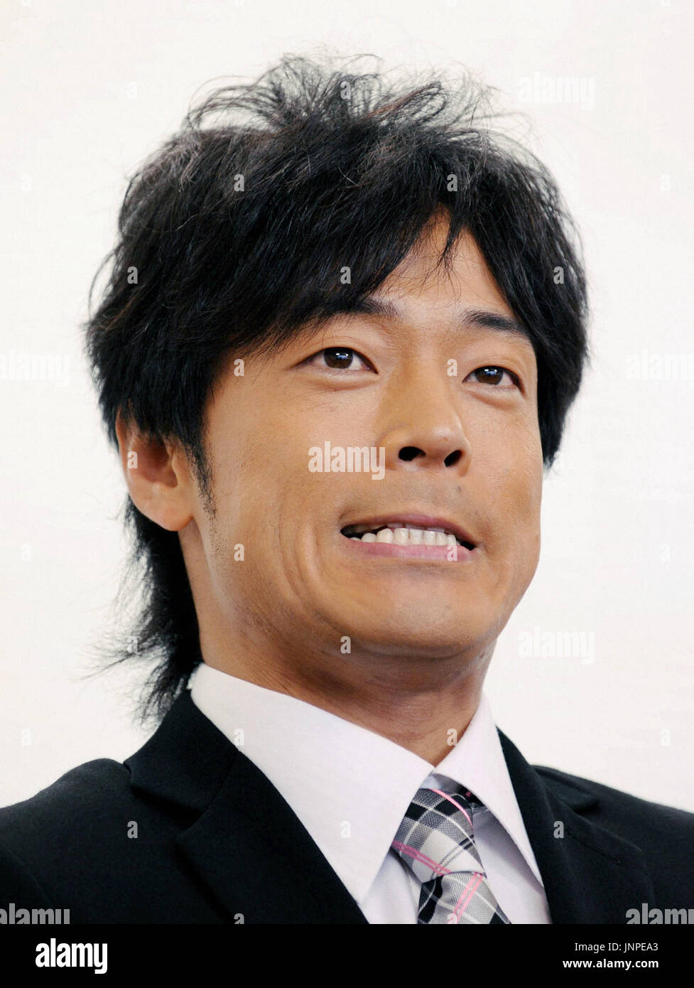 TOKYO, Japan - Comedian Tomonori Jinnai, at the center of a high ...