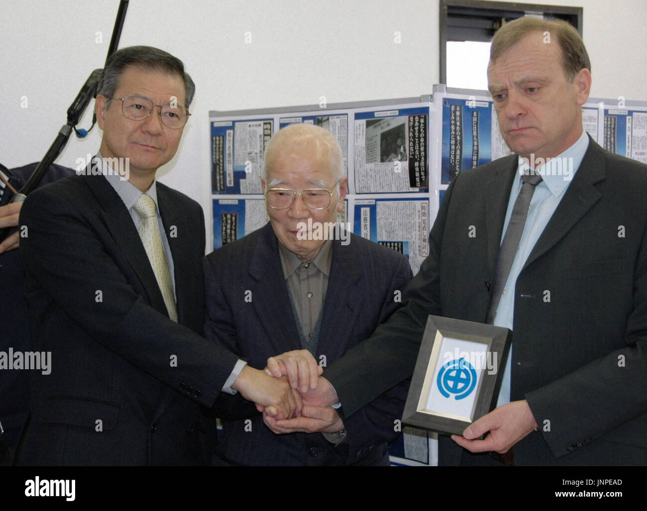TOKYO, Japan - William Hawker (R), 56, the visiting father of slain ...