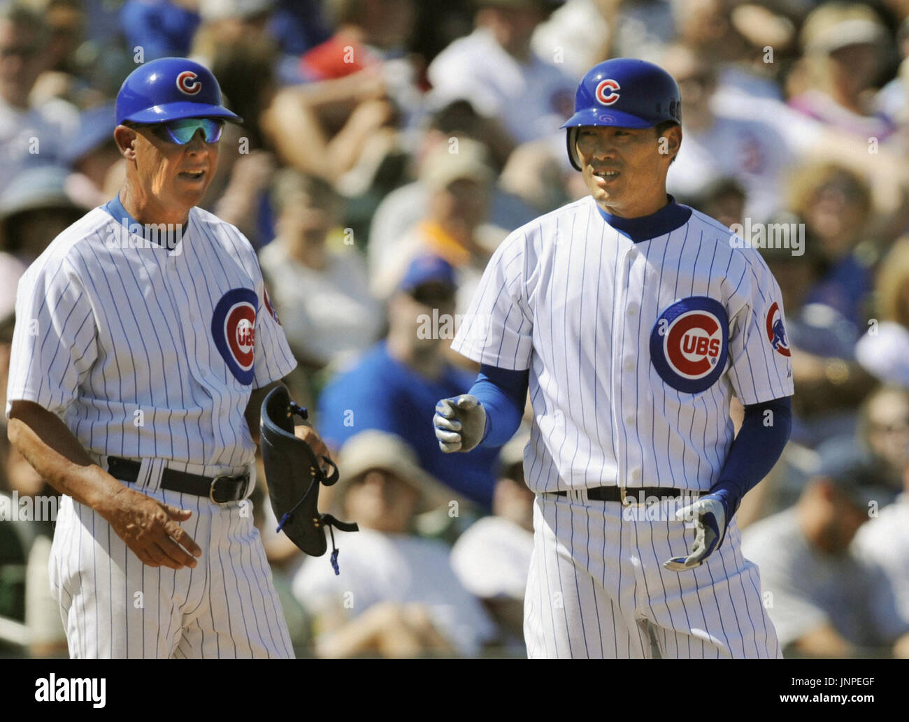 MESA, United States - Chicago Cubs outfielder Kosuke Fukudome (R ...