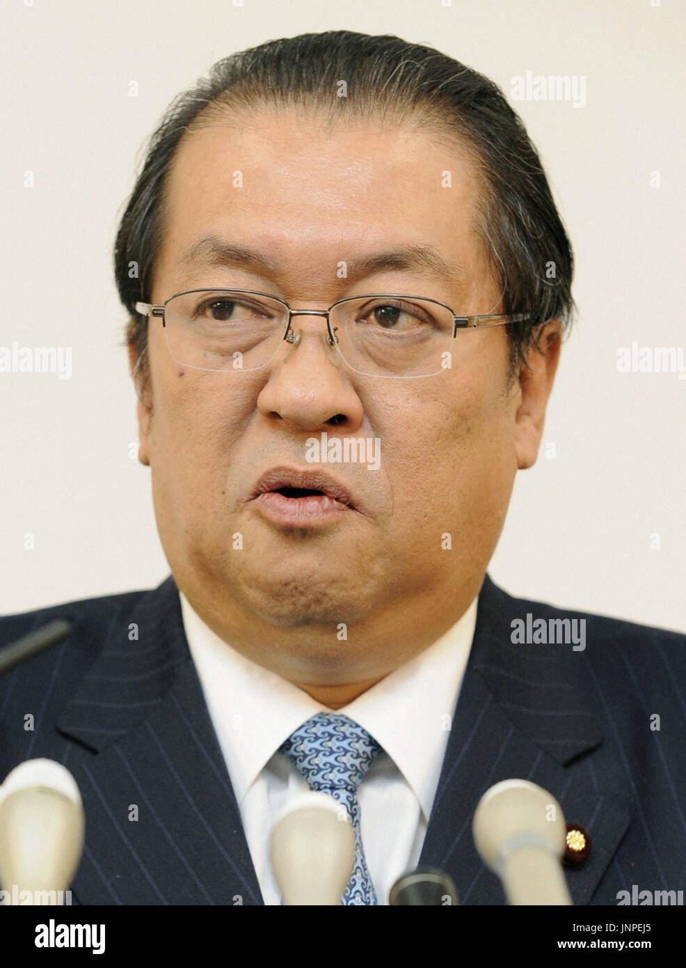 TOKYO, Japan - Internal affairs minister Kunio Hatoyama speaks at a ...