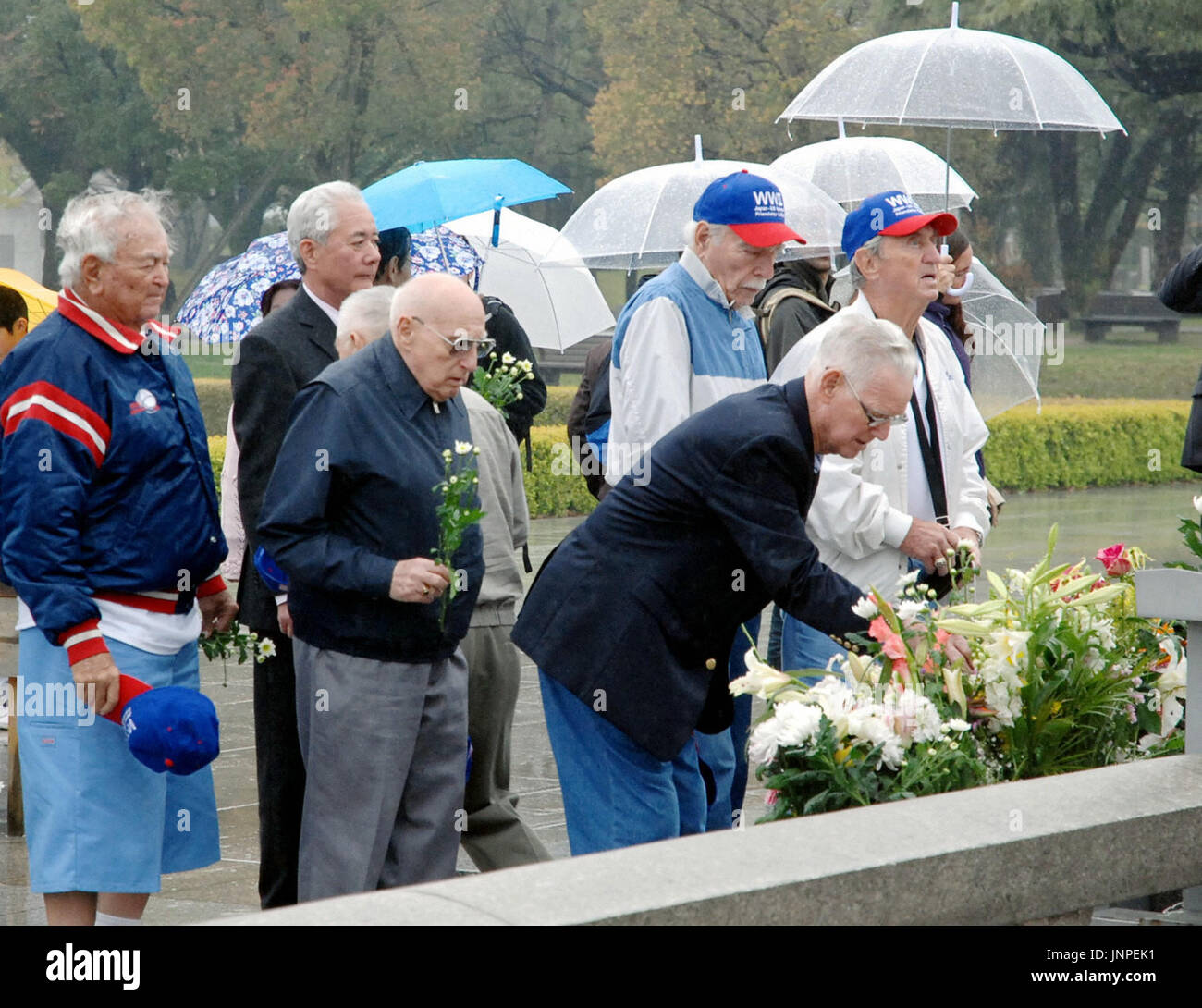 HIROSHIMA, Japan - American veterans of World War II lay flowers at the ...
