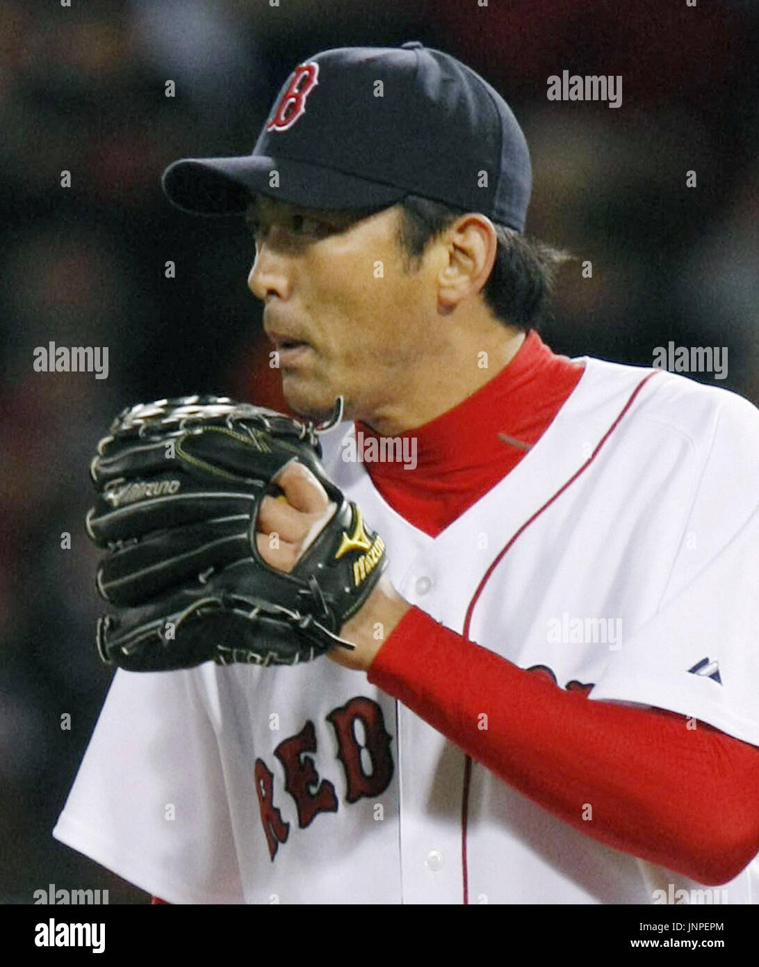 BOSTON, United States - Boston Red Sox pitcher Takashi Saito reacts ...