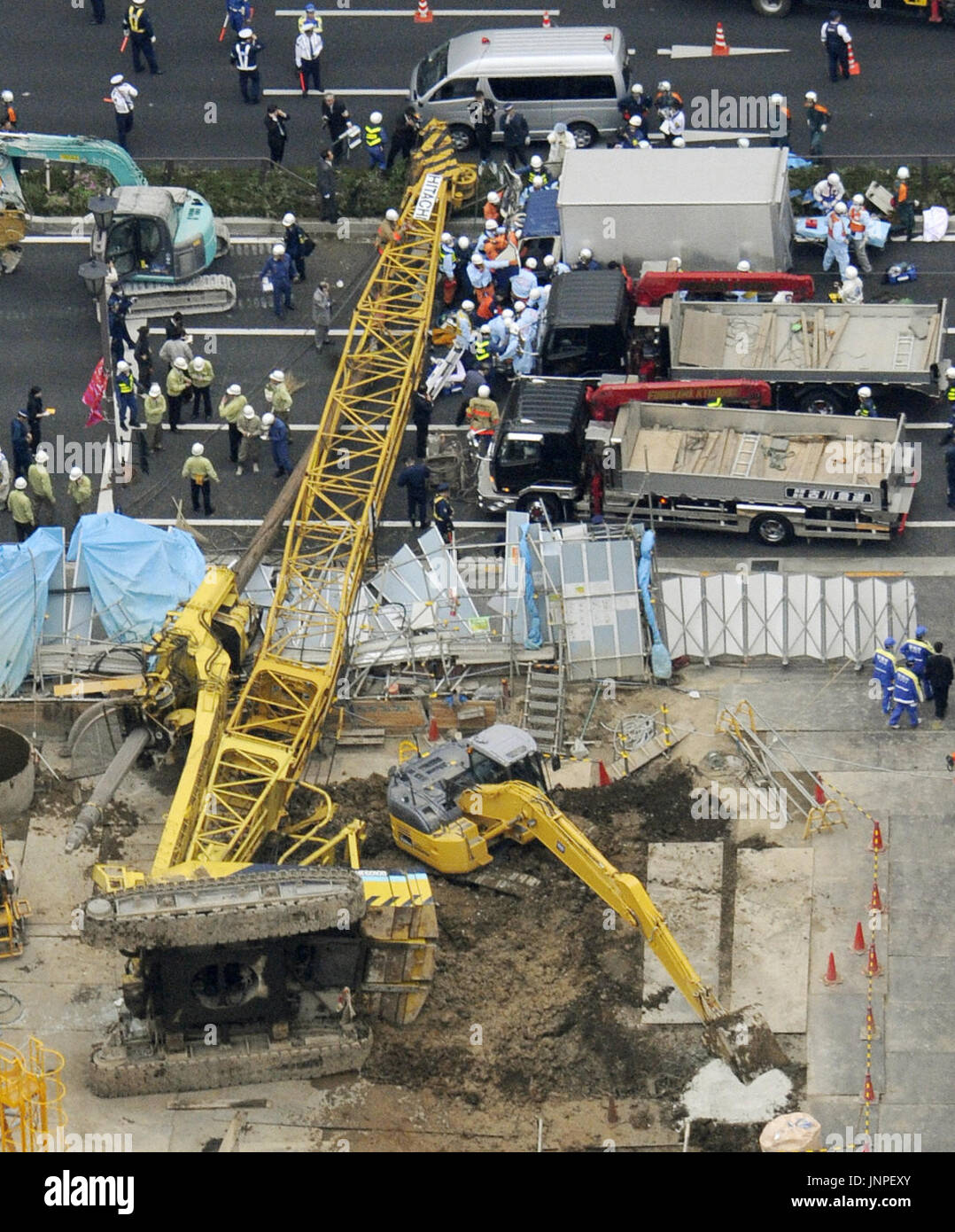 TOKYO, Japan - A heavy-duty pile driver remains blocking three lanes of ...