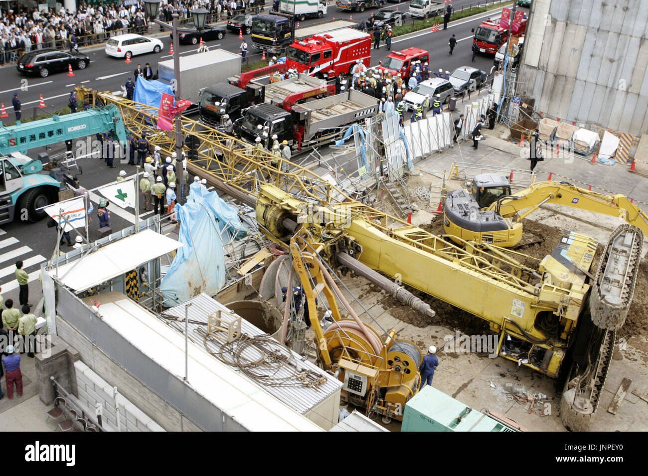 TOKYO, Japan - A heavy-duty pile driver remains blocking three lanes of ...
