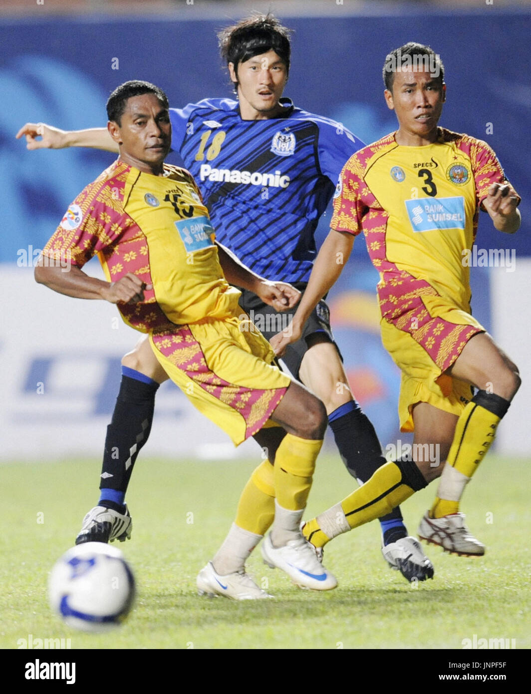 PALEMBANG, Indonesia - Gamba Osaka forward Cho Jae Jin (C) shoots as ...