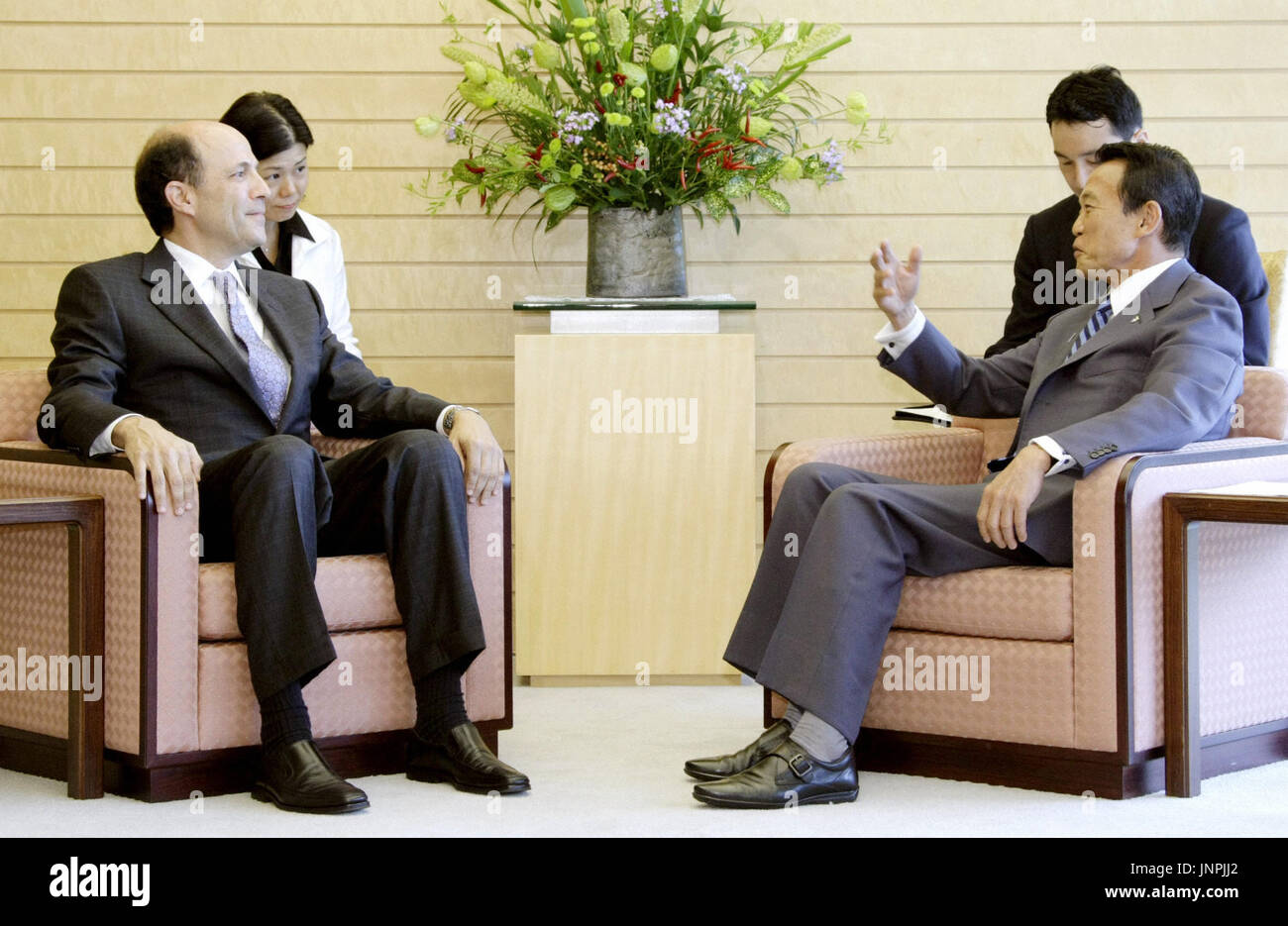 TOKYO, Japan - John Roos (L), the new U.S. ambassador to Japan, holds ...