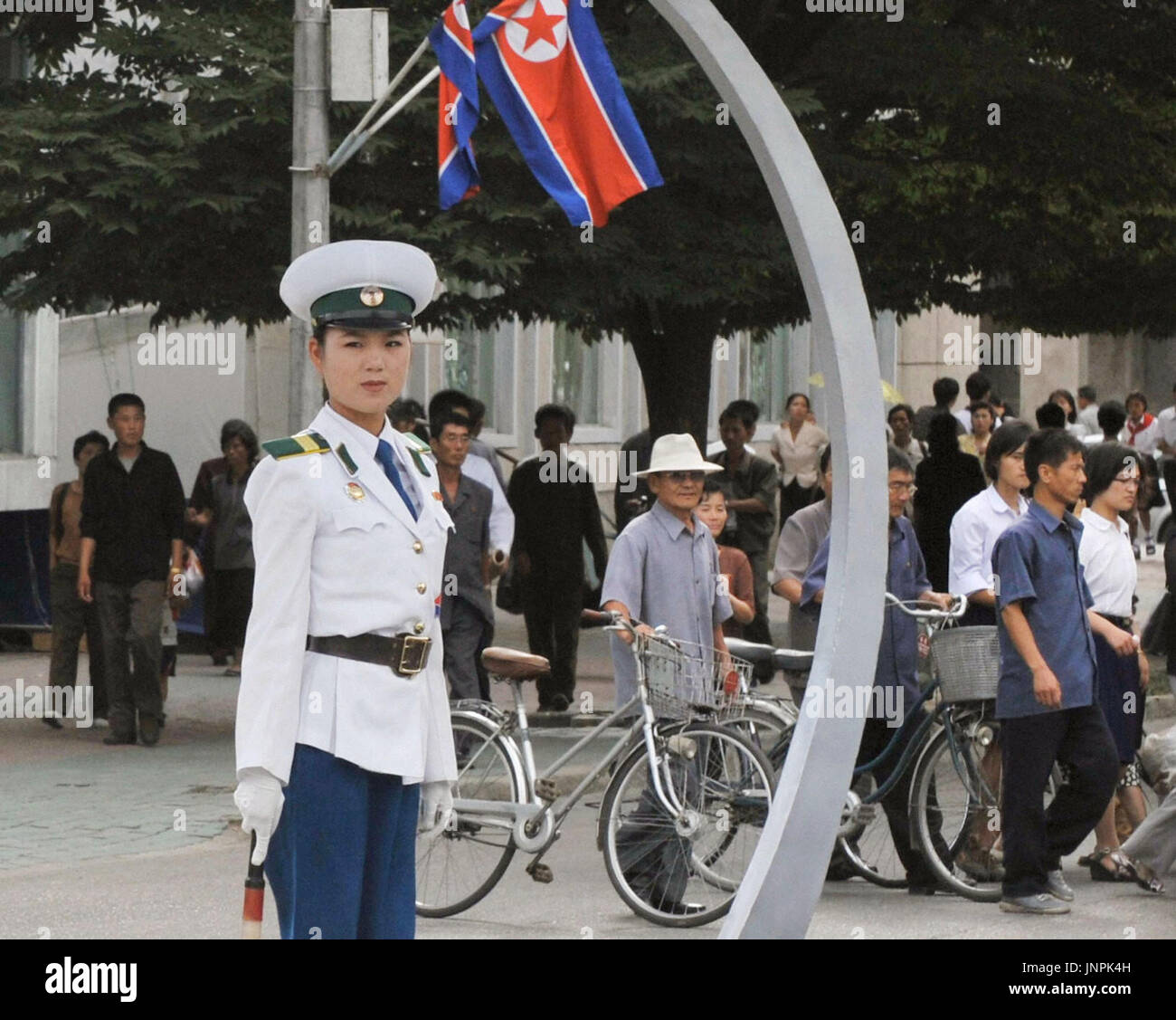 PYONGYANG, North Korea - People walk on the streets in Pyongyang under ...