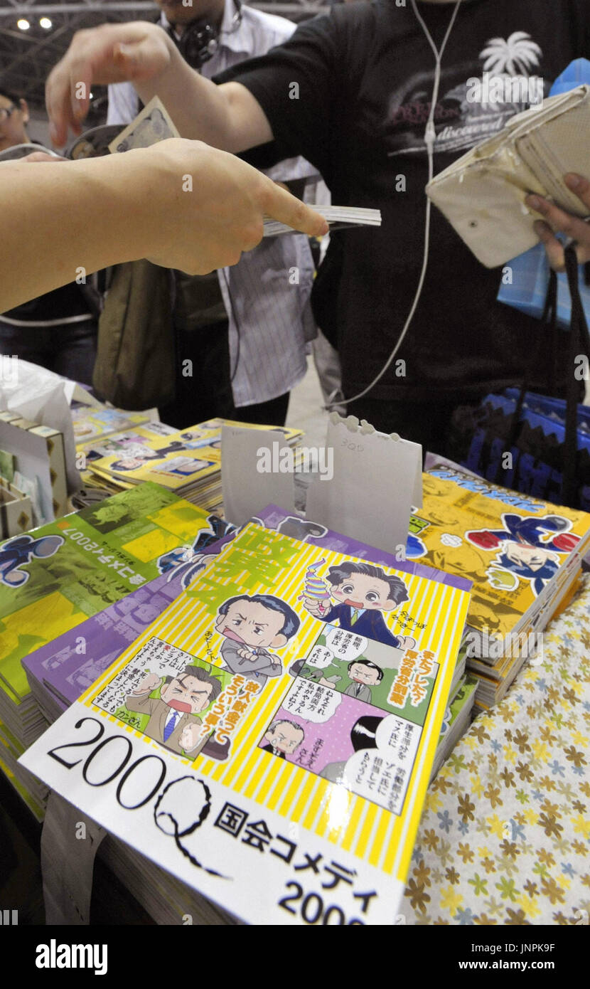 TOKYO, Japan - Comics on politics themes are seen displayed among other ...