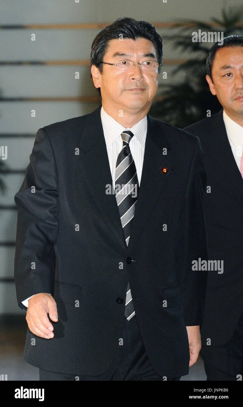 TOKYO, Japan - Environment Minister Sakihito Ozawa arrives at the ...