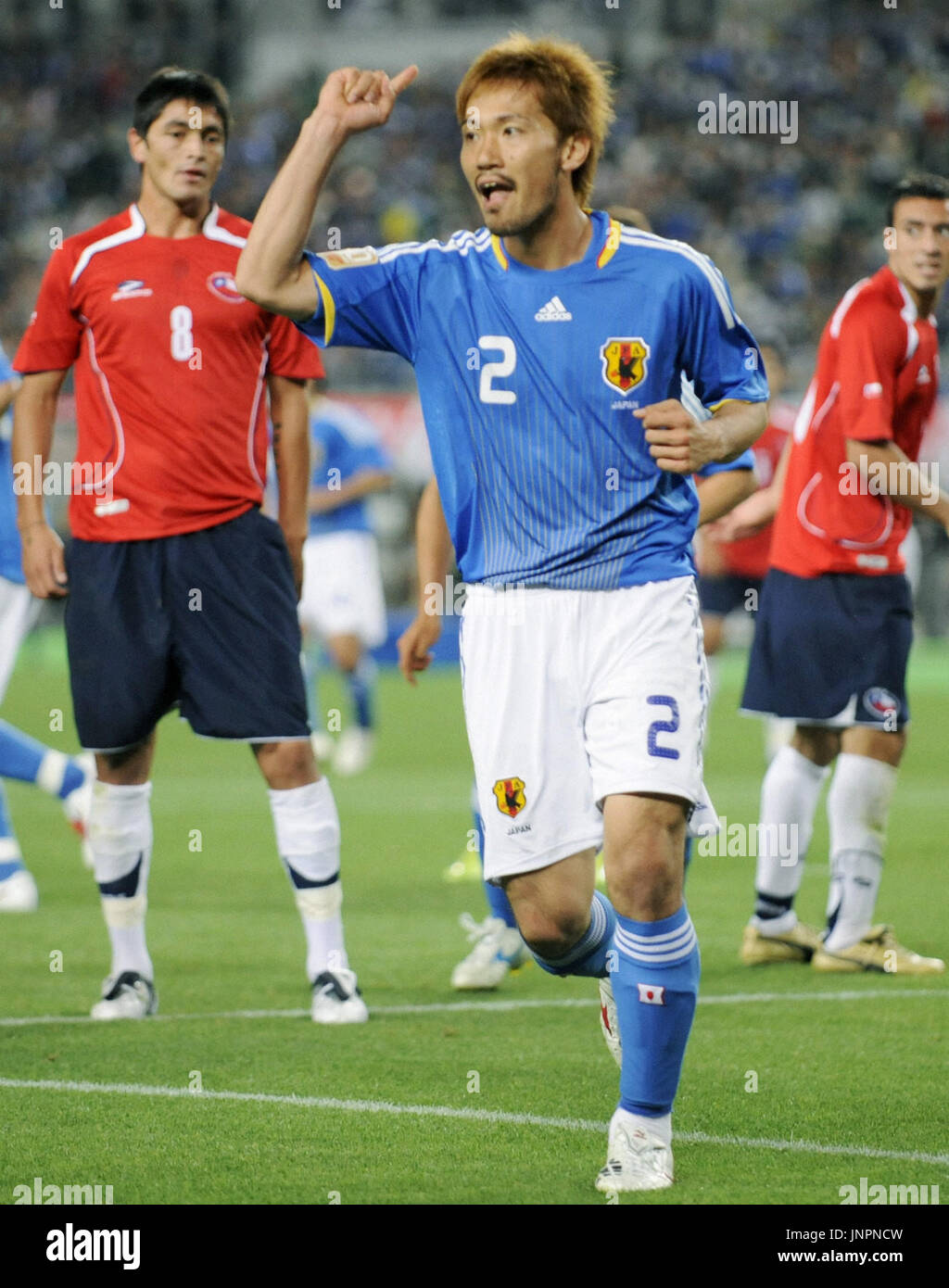 OSAKA, Japan - Japan midfielder Yuki Abe celebrates after heading his ...