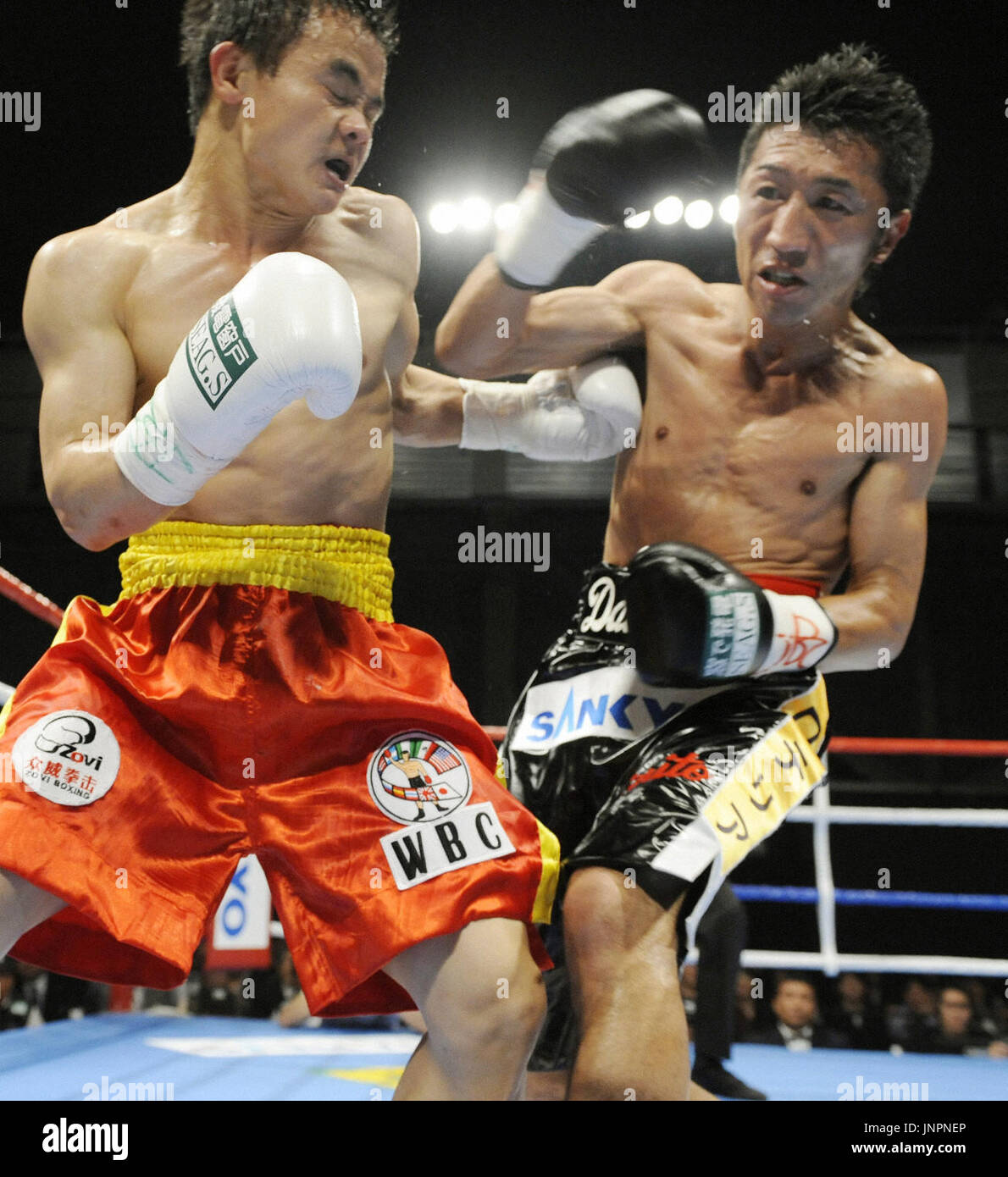 TOKYO, Japan - Japanese defending champion Daisuke Naito (R) and ...