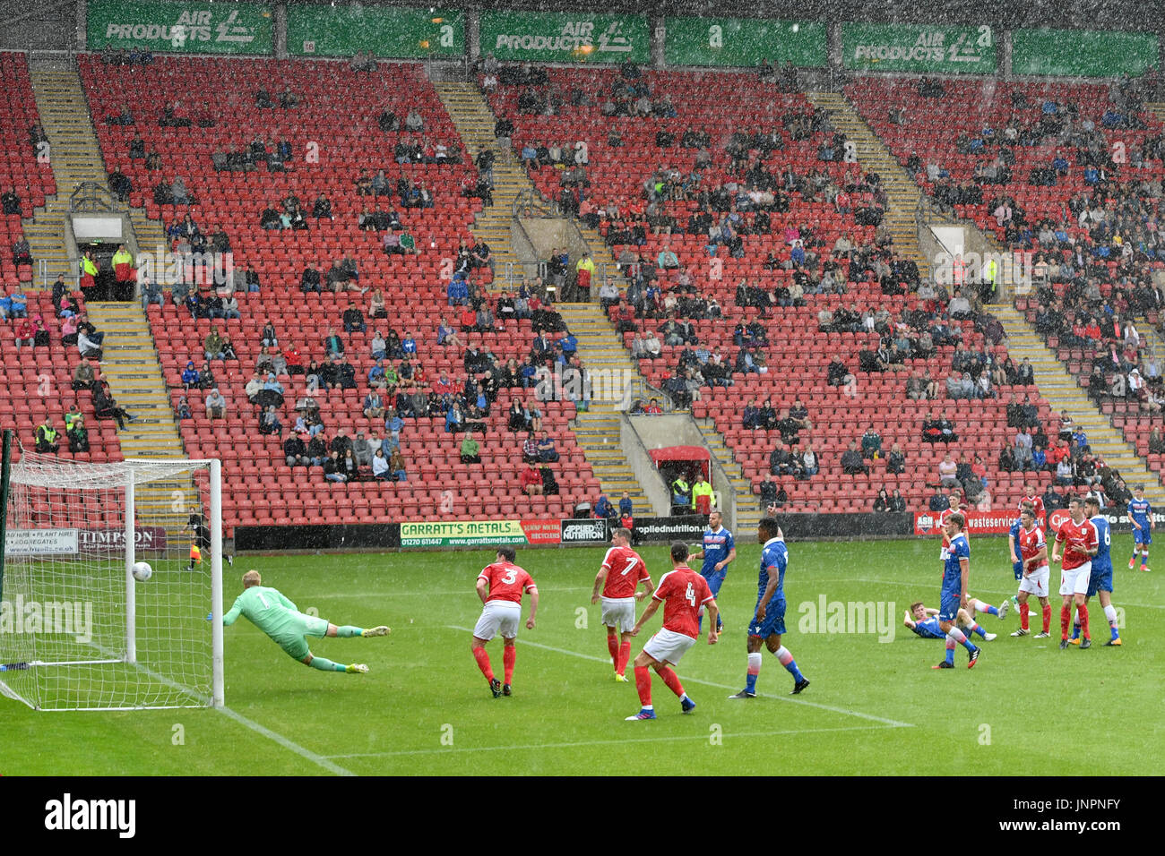 Crewe's Chris Porter scores as heavy rain falls during the pre-season ...