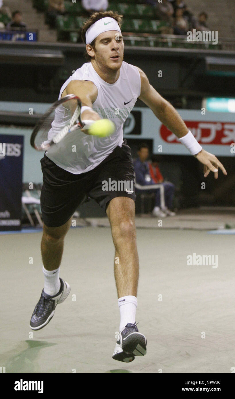 TOKYO, Japan - Top-seeded Juan Martin del Potro of Argentina stretches ...