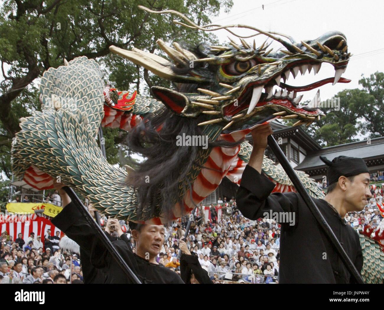 NAGASAKI, Japan - A dragon dance is performed in the Suwa Shrine's 370 ...