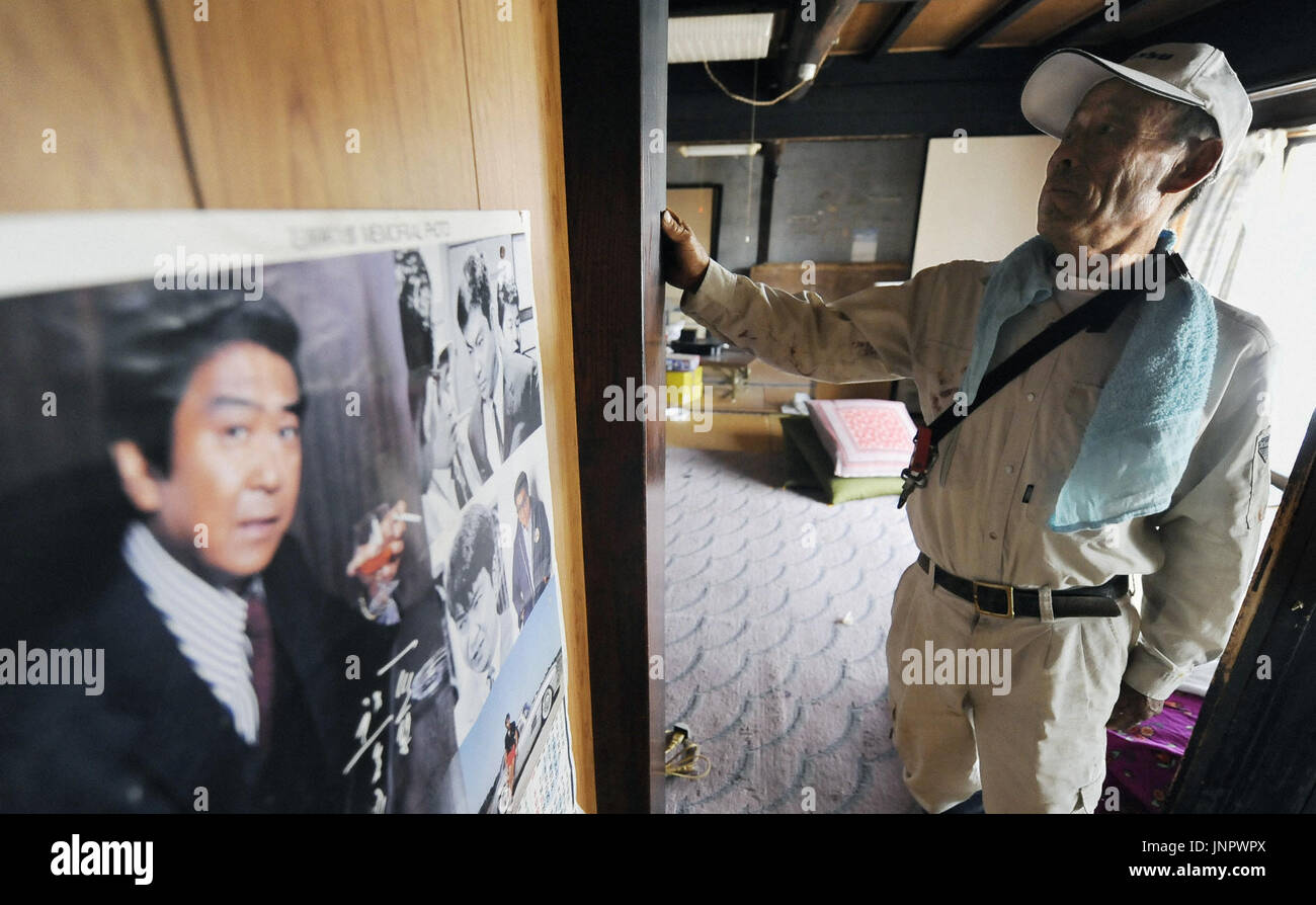 NAGANOHARA, Japan - Goichiro Takeuchi, 64, stares at a pillar of a roughly 90-year-old home in ...