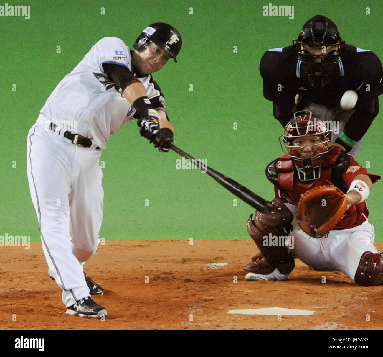 SAPPORO, Japan - Terrmel Sledge (L) hits a walk-off grand slam with one ...