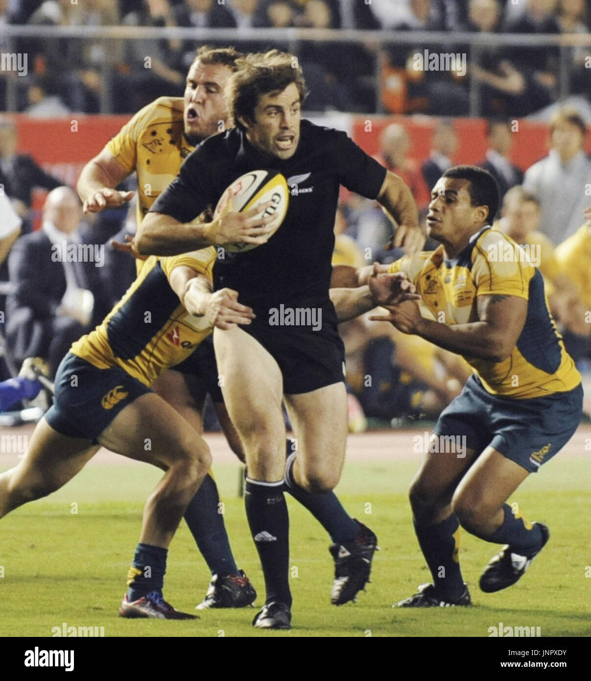 TOKYO, Japan - Conrad Smith of the New Zealand All Blacks tries to ...