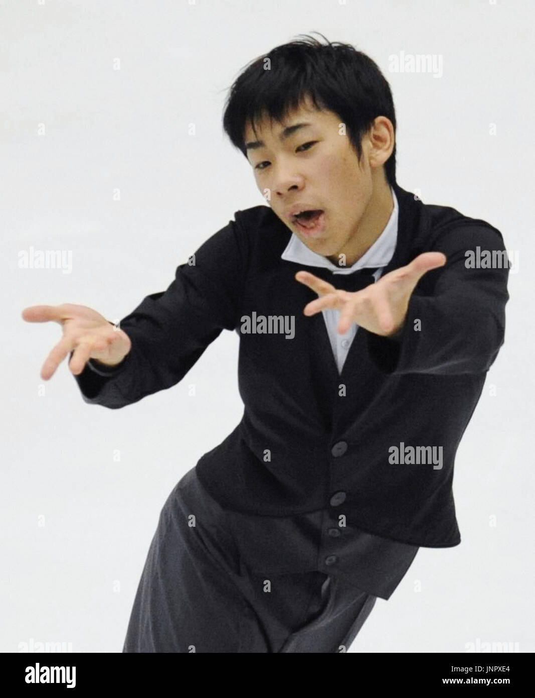 BEIJING, China - Nobunari Oda of Japan performs in the men's free skate ...