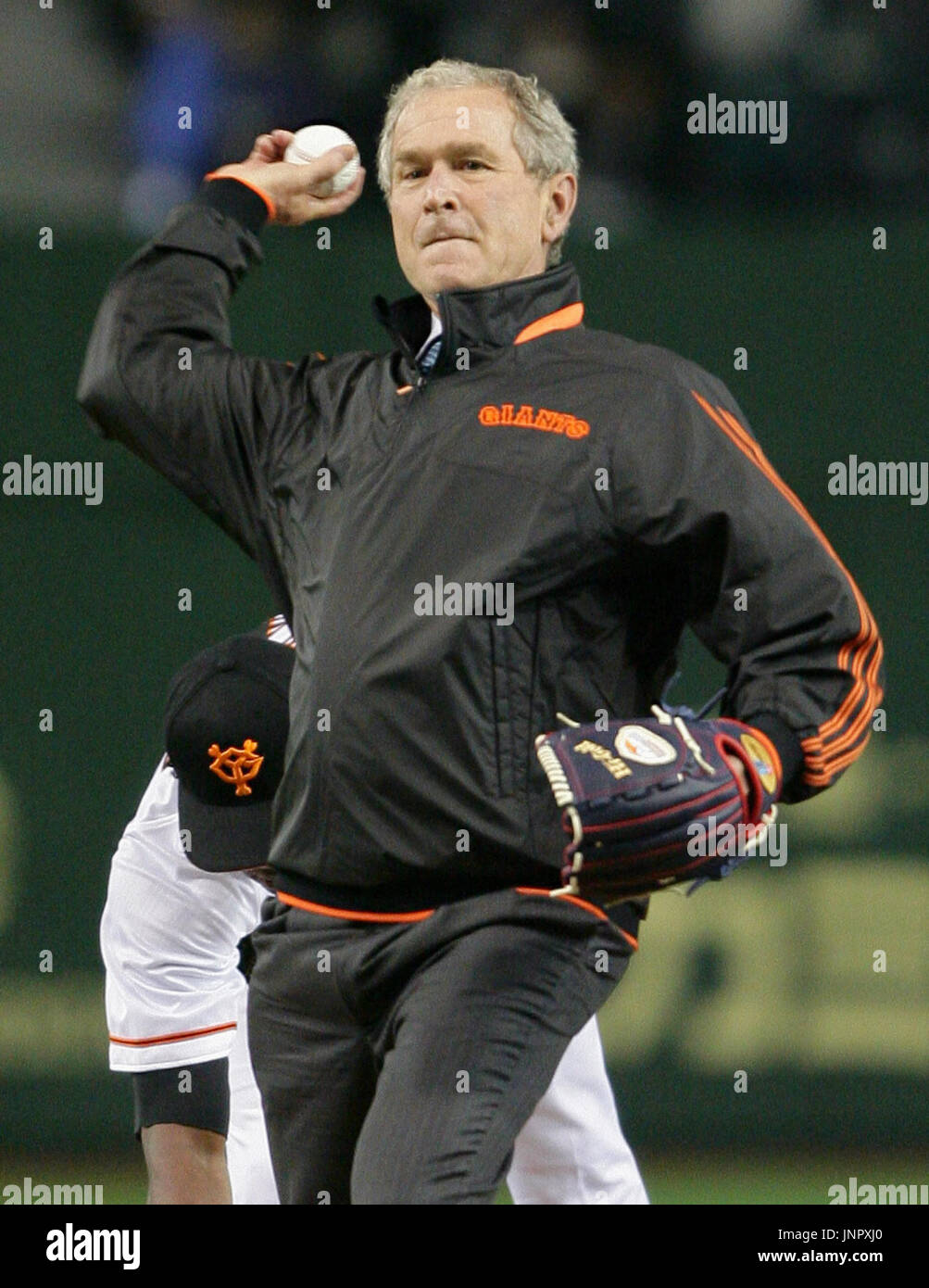 TOKYO, Japan - Former U.S. President George W. Bush throws the ...