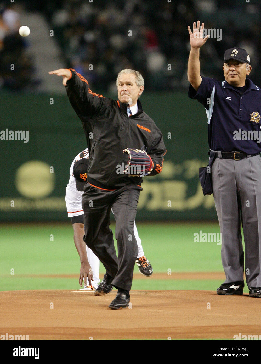 TOKYO, Japan - Former U.S. President George W. Bush throws the ...