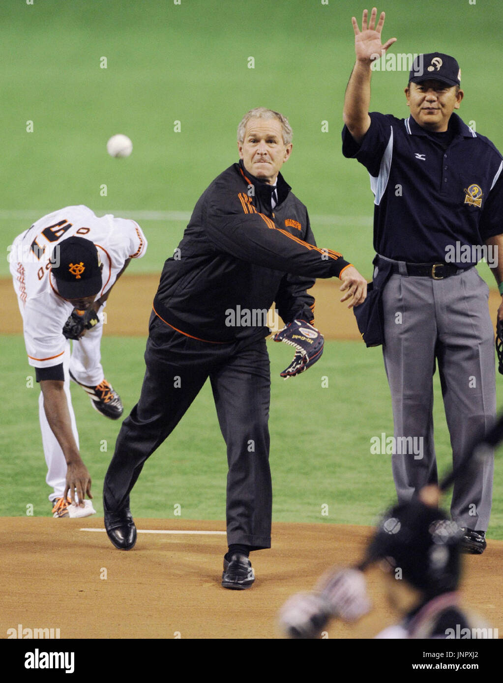 TOKYO, Japan - Former U.S. President George W. Bush throws the ...