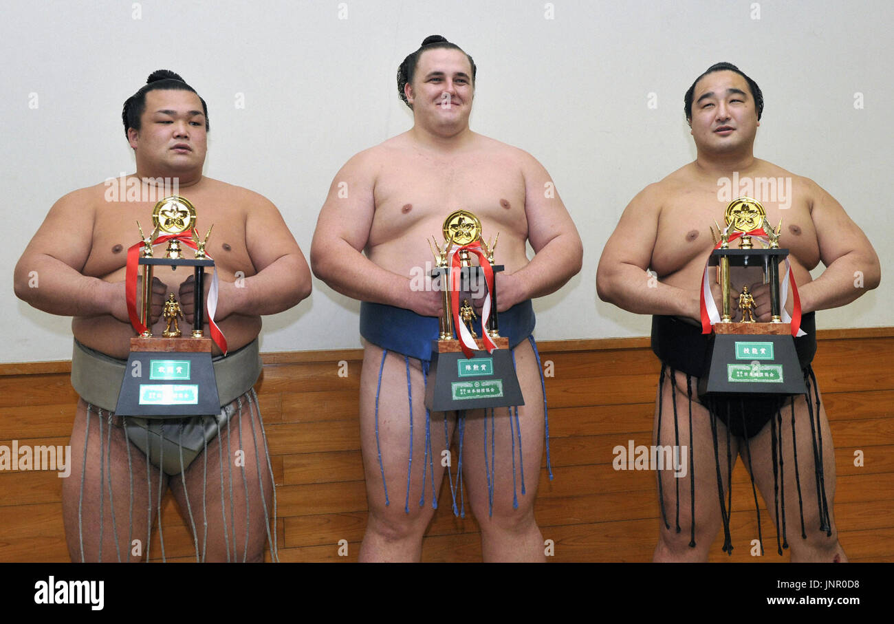 TOKYO, Japan - Recipients of three special prizes the Japan Sumo ...