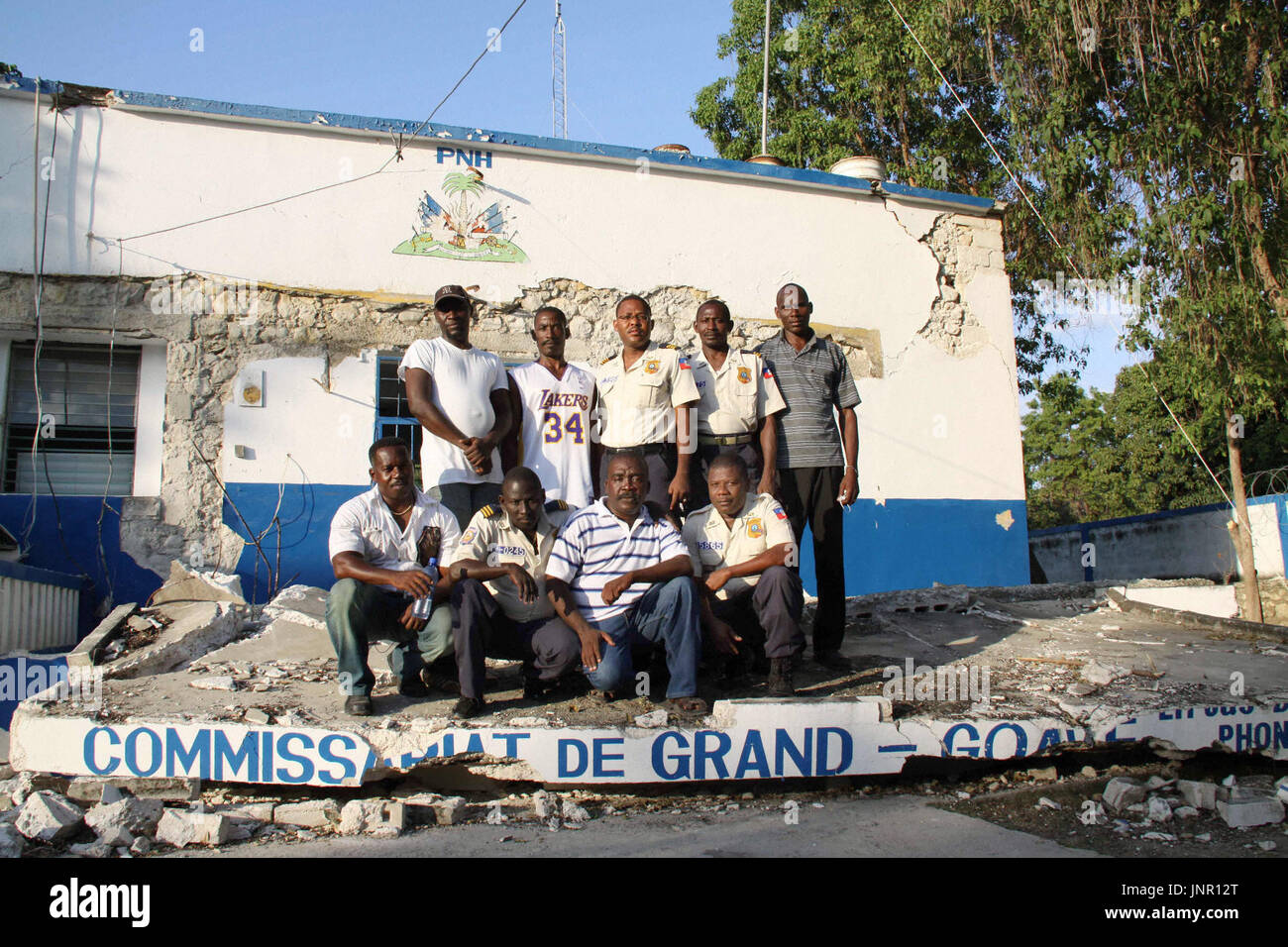 GRAND-GOAVE, Haiti - People including police officers are photographed ...