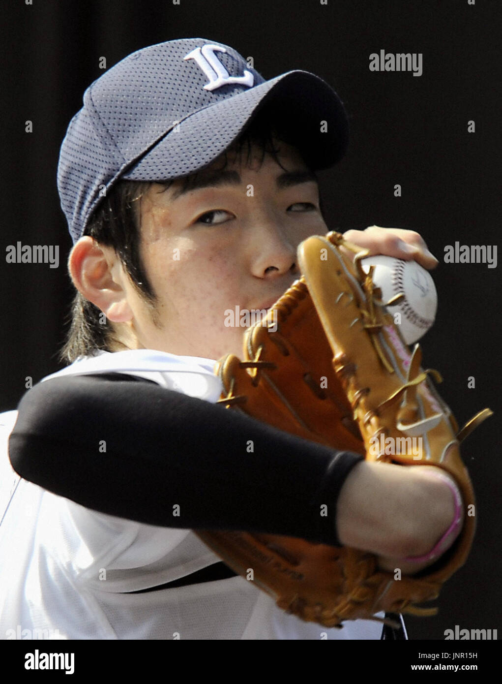 NICHINAN, Japan - Seibu Lions rookie Yusei Kikuchi throws a ball during ...