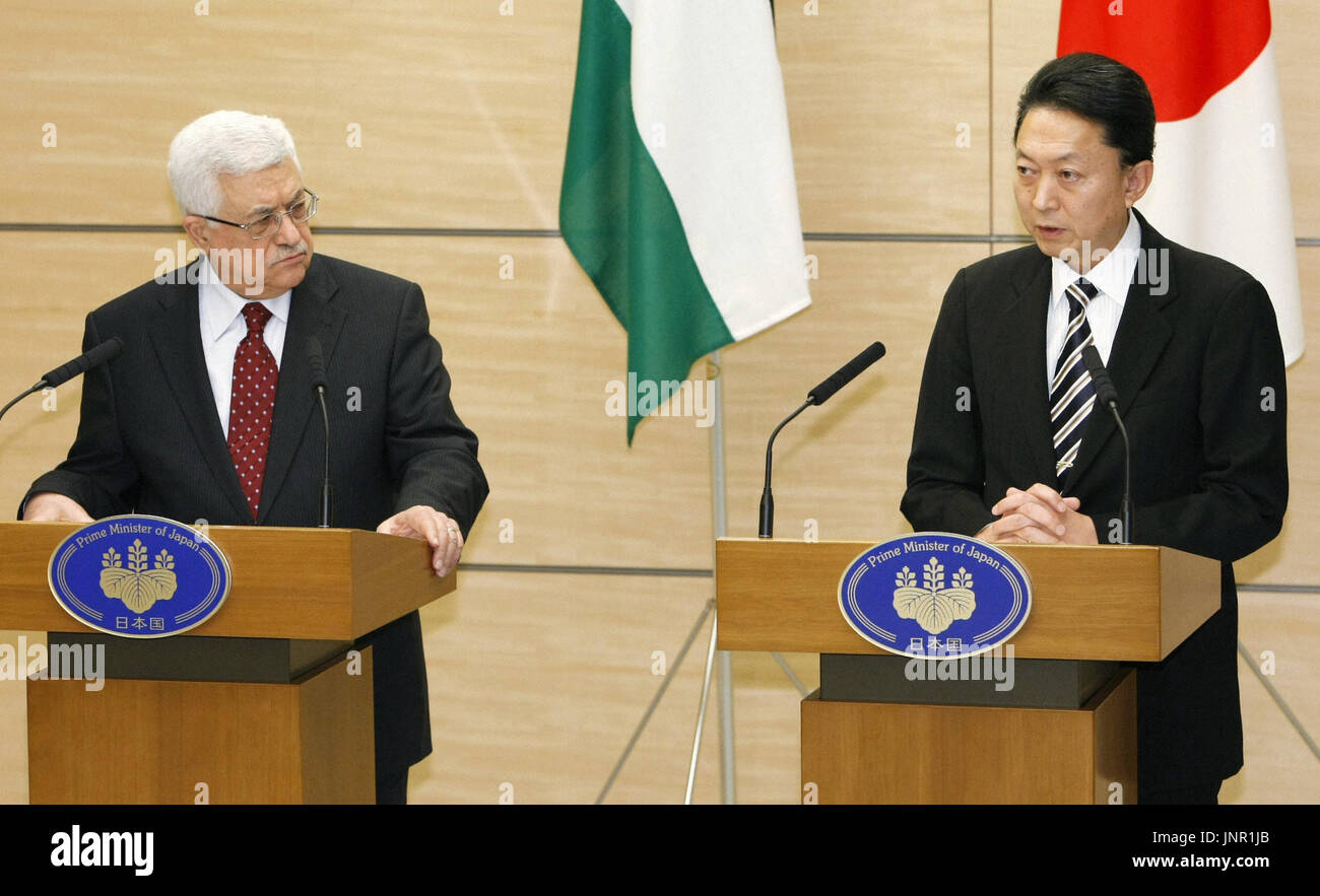 TOKYO, Japan - Visiting Palestinian President Mahmoud Abbas (L) and ...