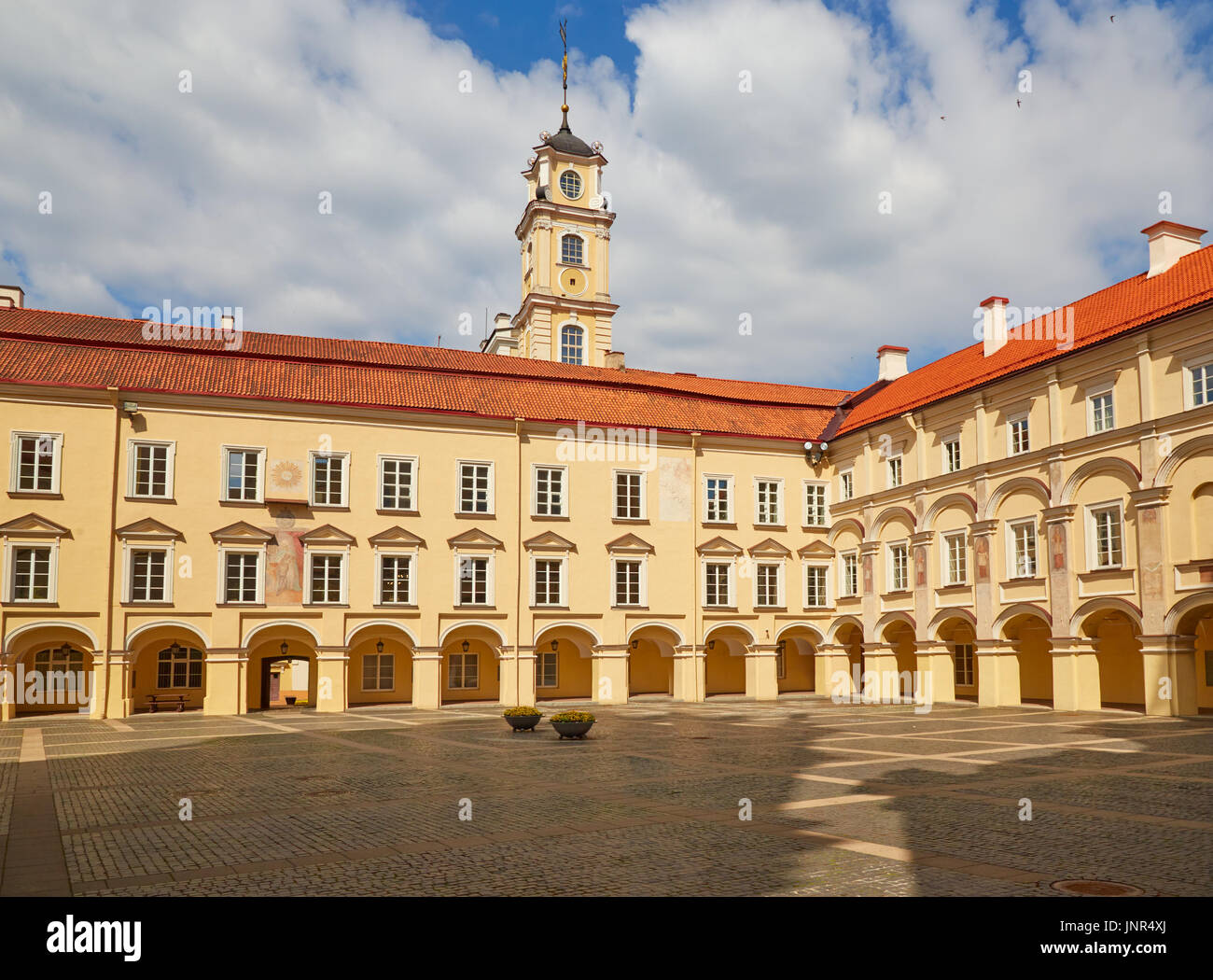 The courtyard of the old building of Vilnius University in a summer ...