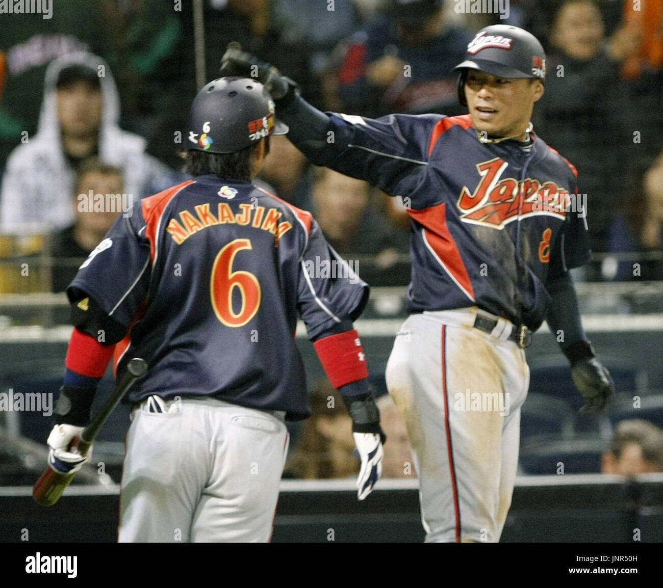 SAN DIEGO, United States - Japan's Akinori Iwamura (R) celebrates his ...