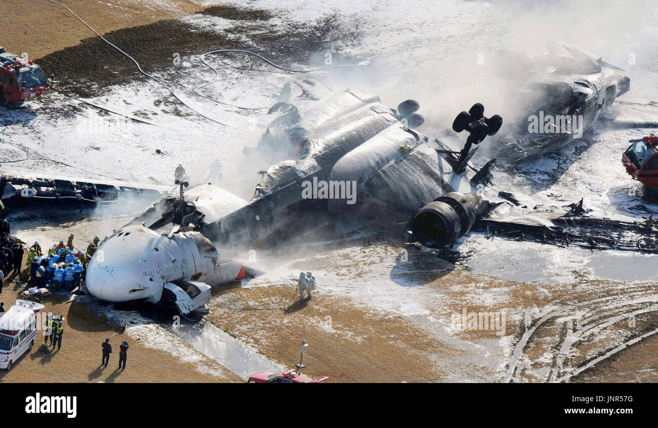 NARITA, Japan - Smoke rises from a FedEx plane at Narita International ...