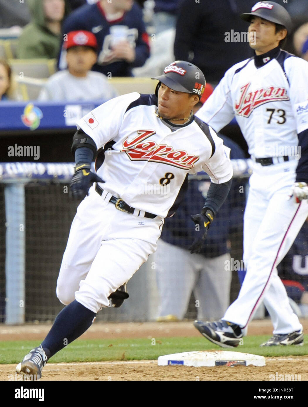 LOS ANGELES, United States - Japan's Akinori Iwamura rounds first base ...