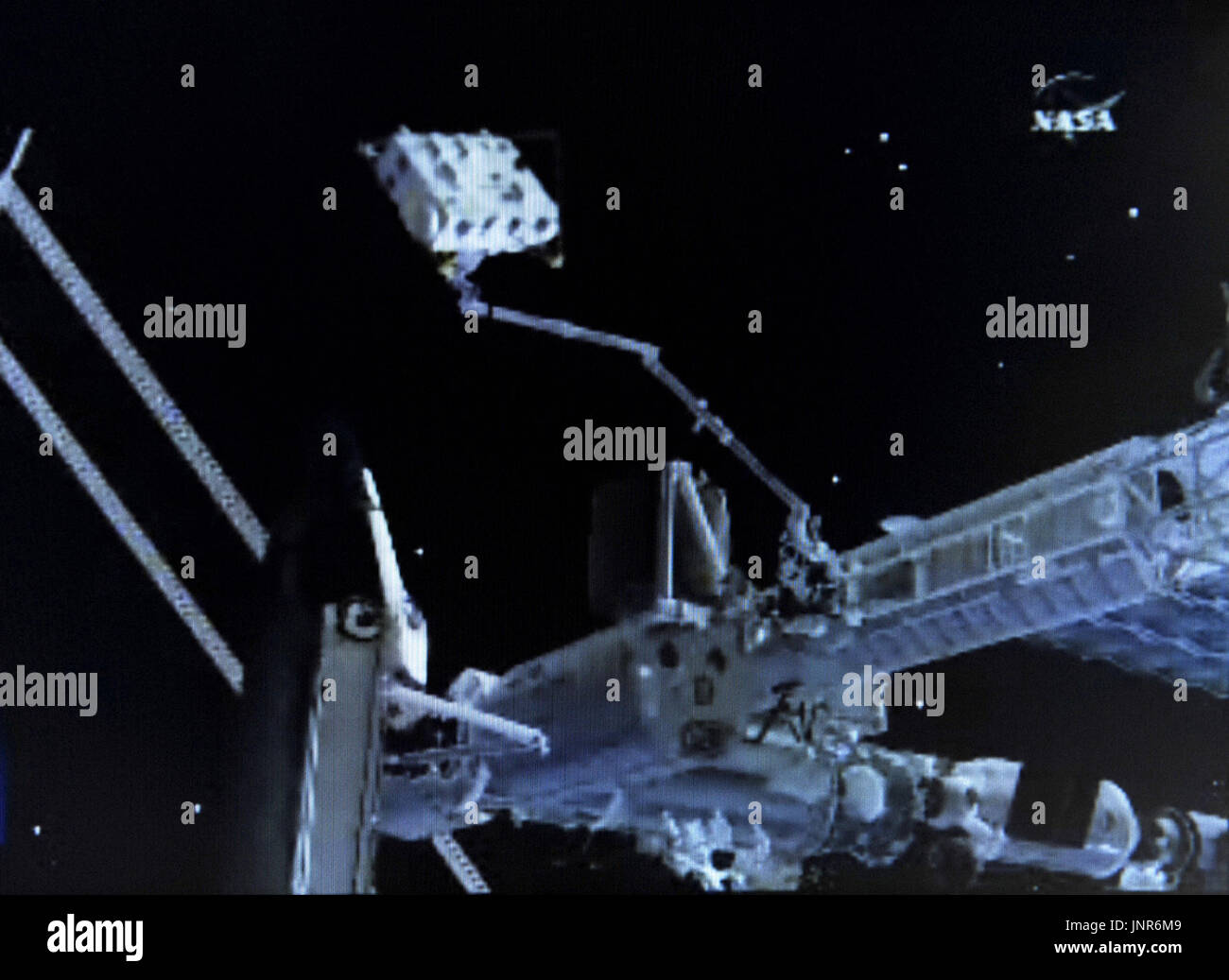 TOKYO, Japan - A module (top) for the Japanese space laboratory Kibo is ...