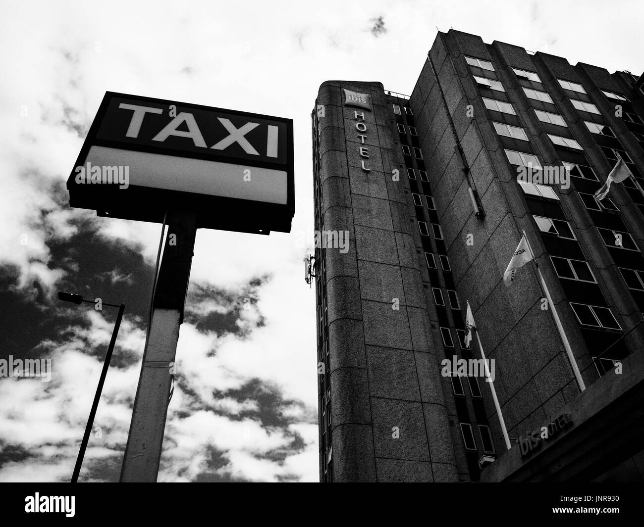 London taxi sign Black and White Stock Photos & Images - Alamy