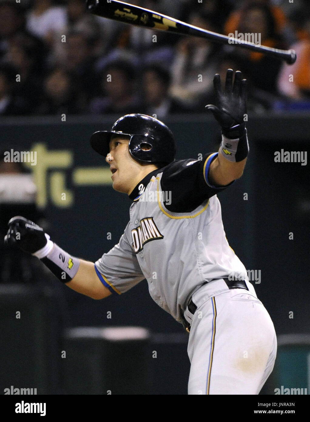 TOKYO, Japan - Nippon Ham Fighters catcher Shinji Takahashi follows ...