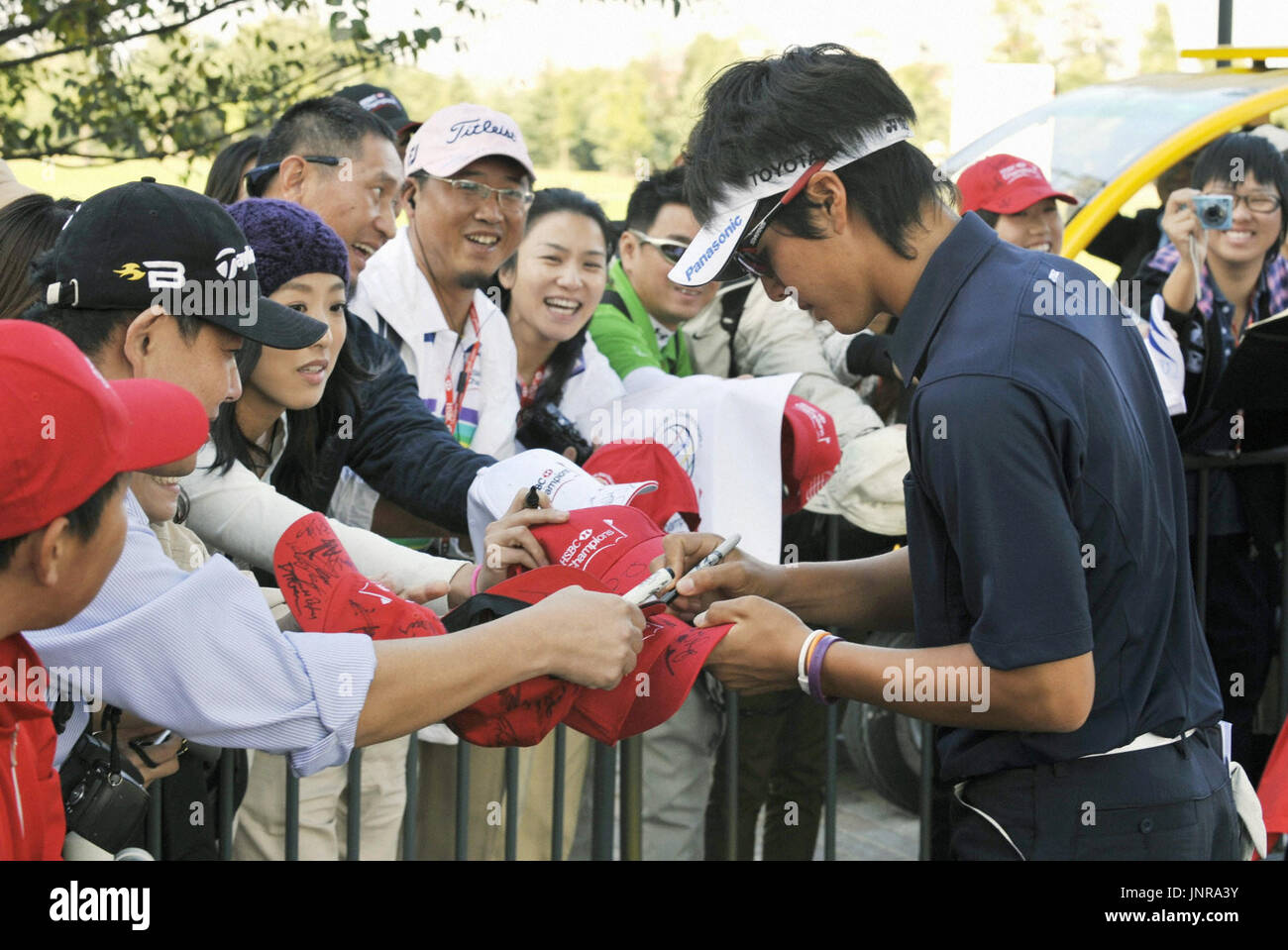 SHANGHAI, China - Japan's Ryo Ishikawa signs autographs for fans at Pro ...